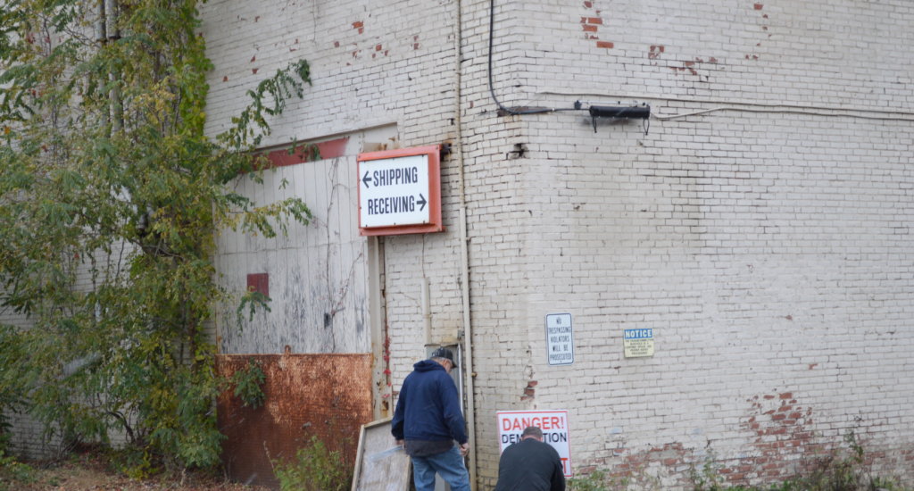 Crews tear down Otis paper mill steam plant